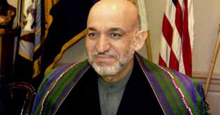 Karzai arrives in Pakistan