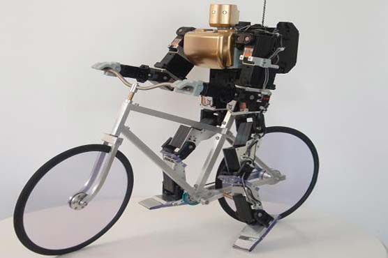 Japanese scientist prepares bicycle riding robot