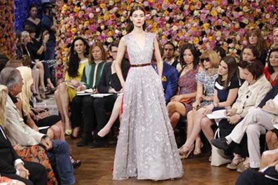 Raf Simons makes dazzling Dior debut with floral bounty
