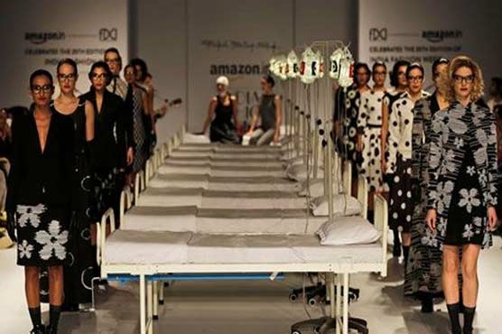 Hospital beds, nurses and IV drips on India's fashion catwalk