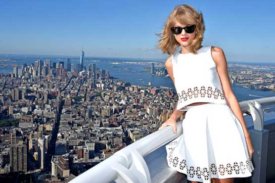 Taylor Swift goes rap, action hero in new video