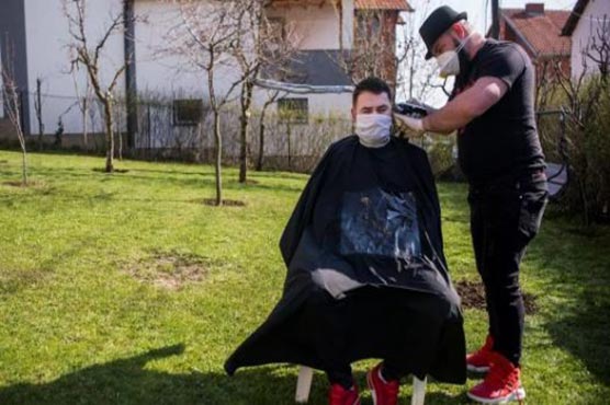 Kosovo's travelling barber keeps hair trimmed in virus lockdown ...