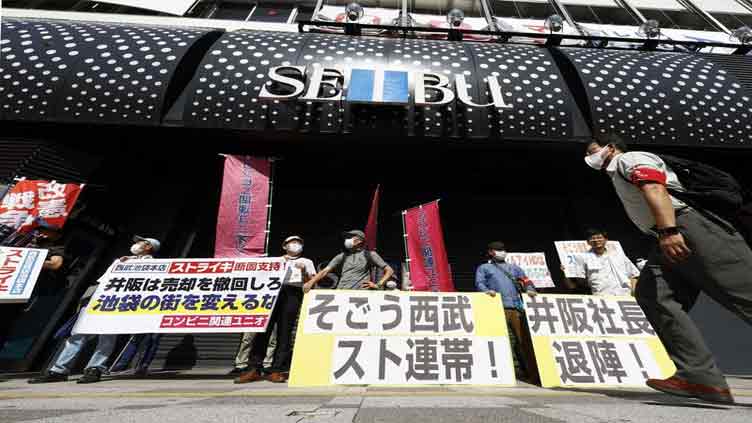 Japan sees rare strike as workers at landmark department store protest ...